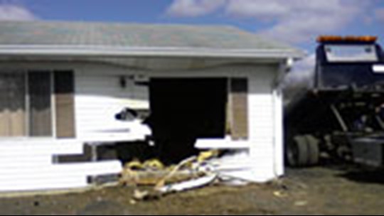 Driver flees after driving car through house | wthr.com Driver flees after driving car through house | wthr.com