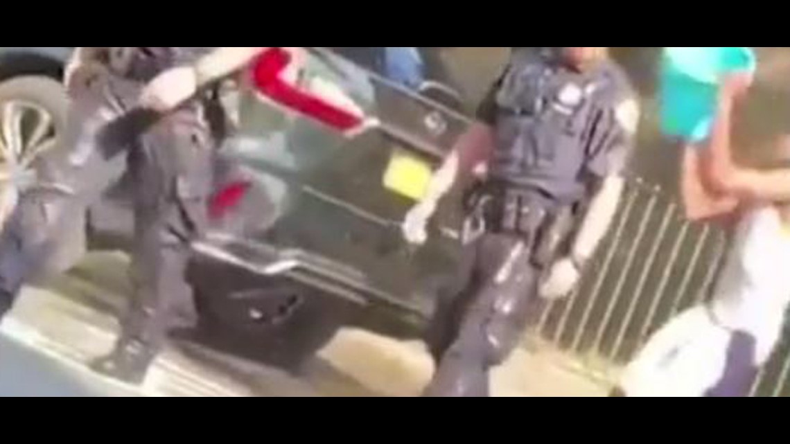 Videos of water being dumped on police officers create stir | wthr.com