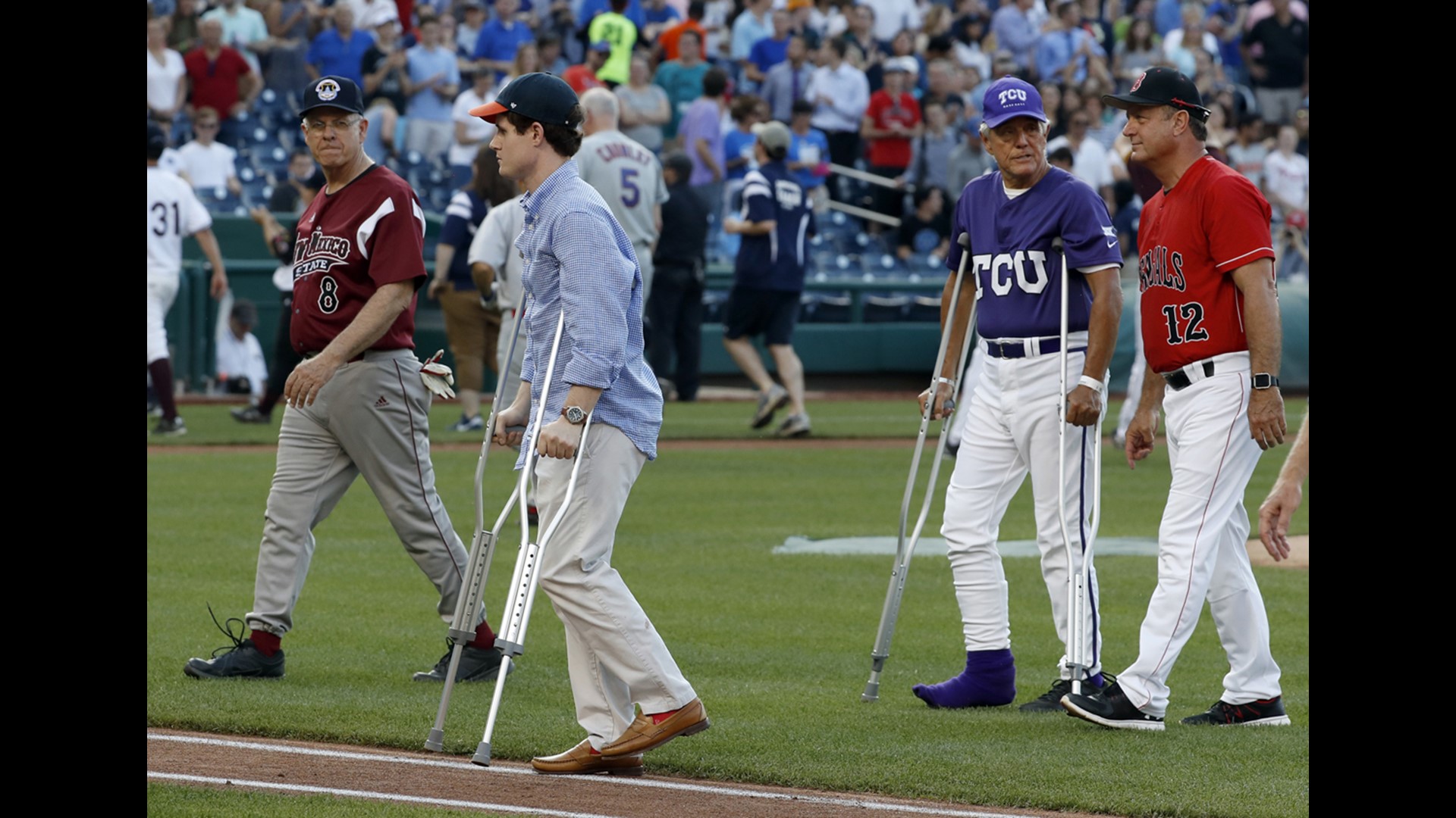 Wounded Capitol Police officer throws out first pitch of Congressional ...
