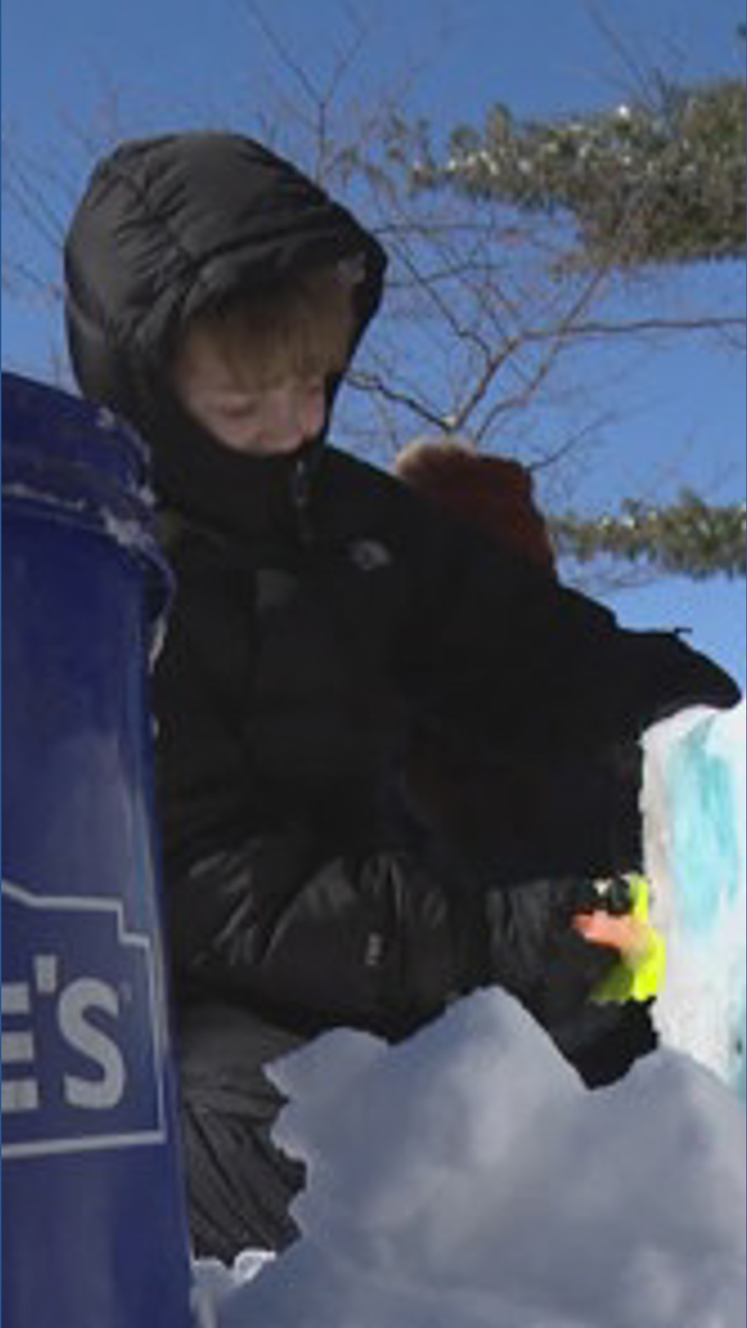 Kids in Broad Ripple build igloo with snow left from winter storm ...