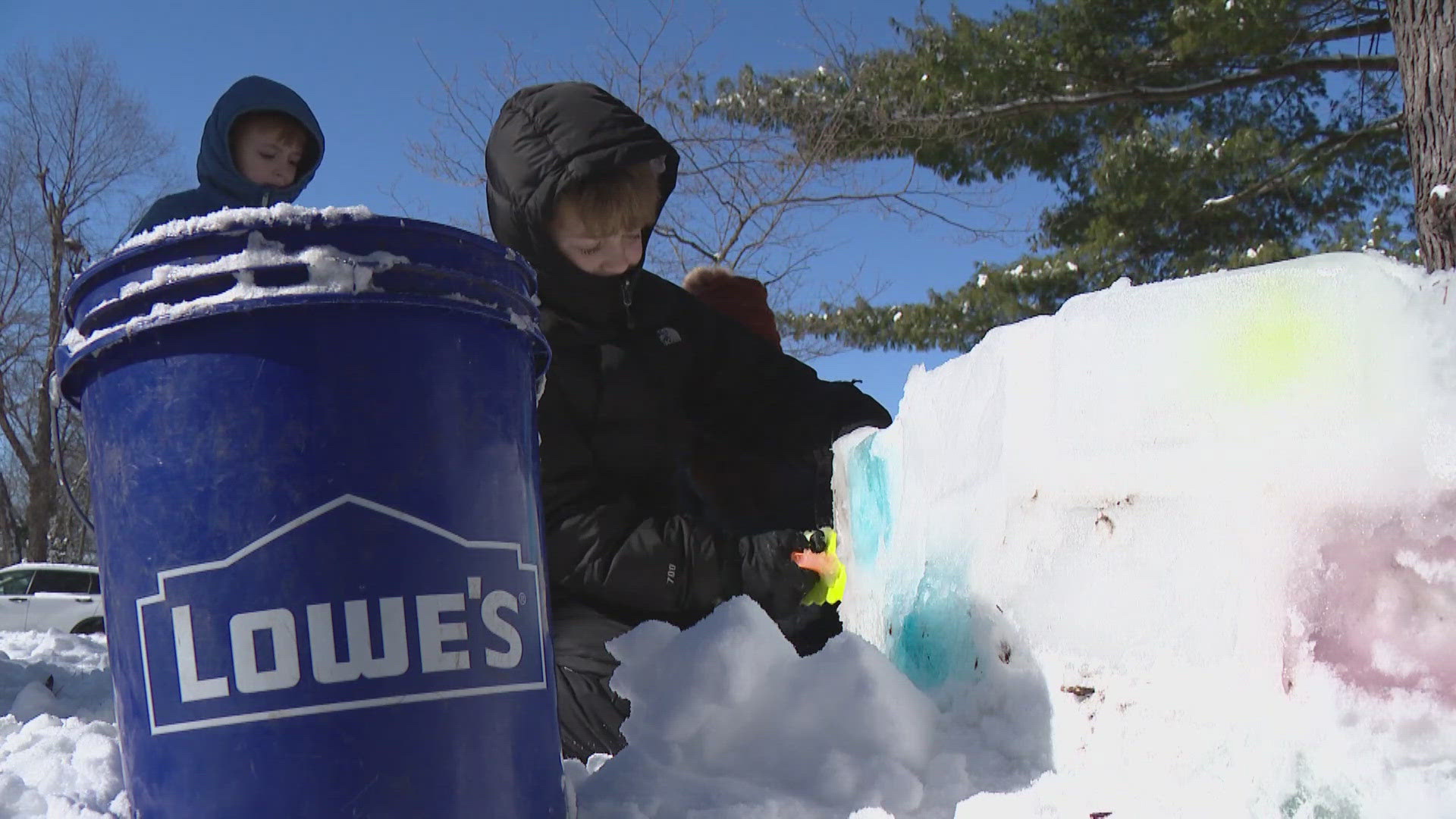 Kids in Broad Ripple build igloo with snow left from winter storm ...