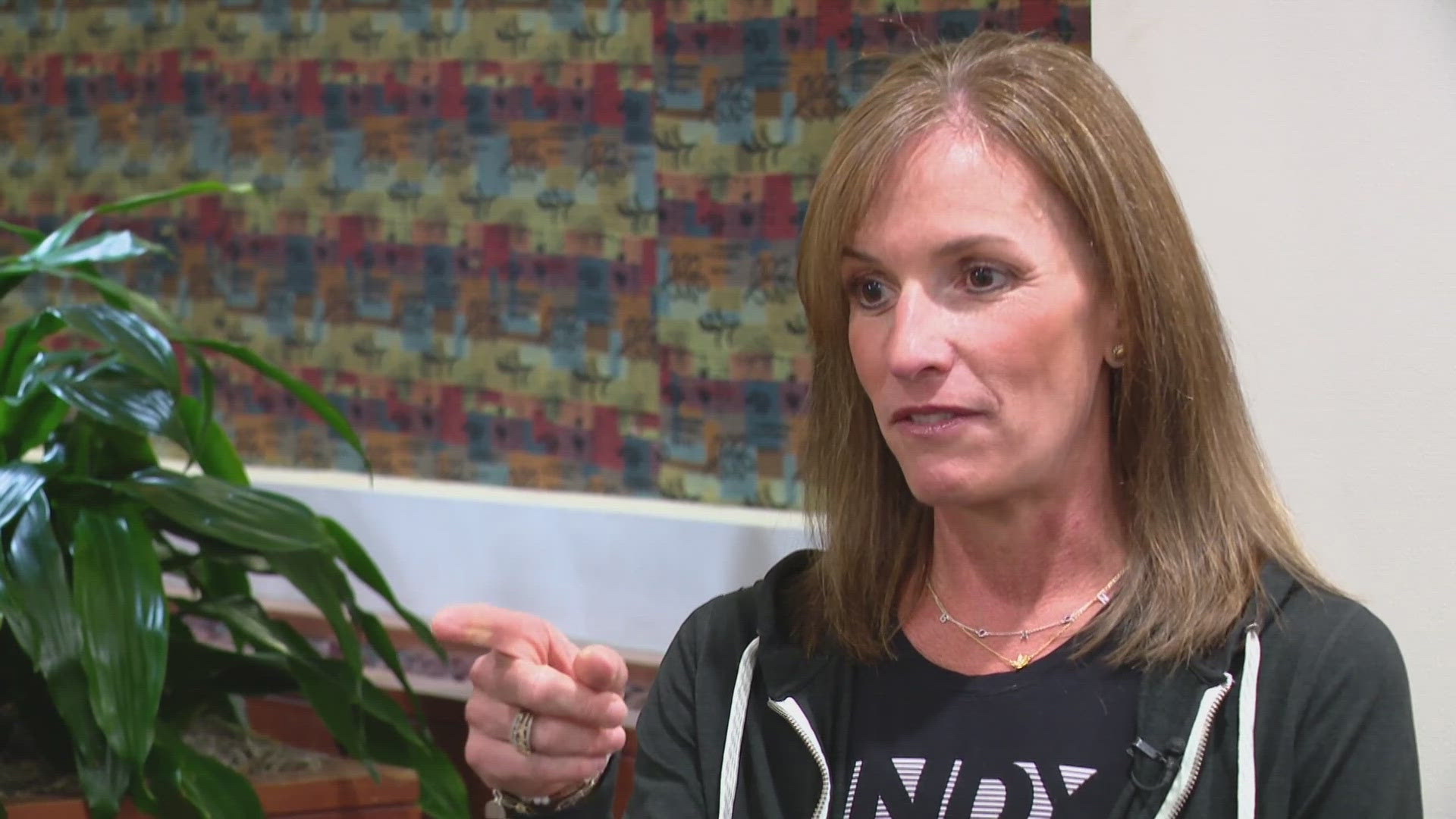 Despite heart condition, 51-year-old woman runs a half marathon nearly ...