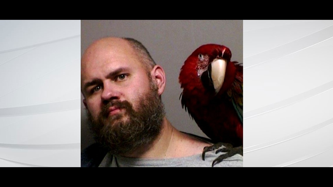 Man takes mugshot with his bird | wthr.com
