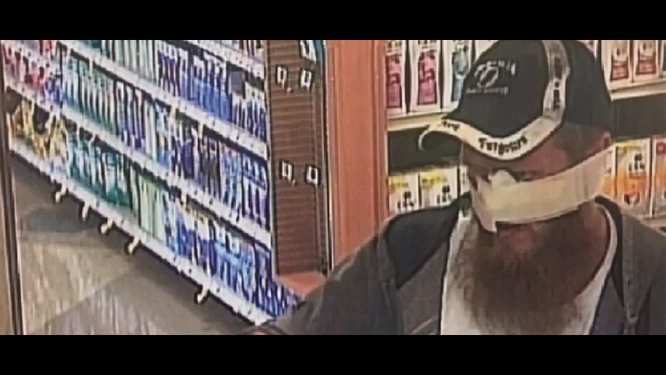 Bank robbery suspect's disguise includes partial guaze mask | wthr.com
