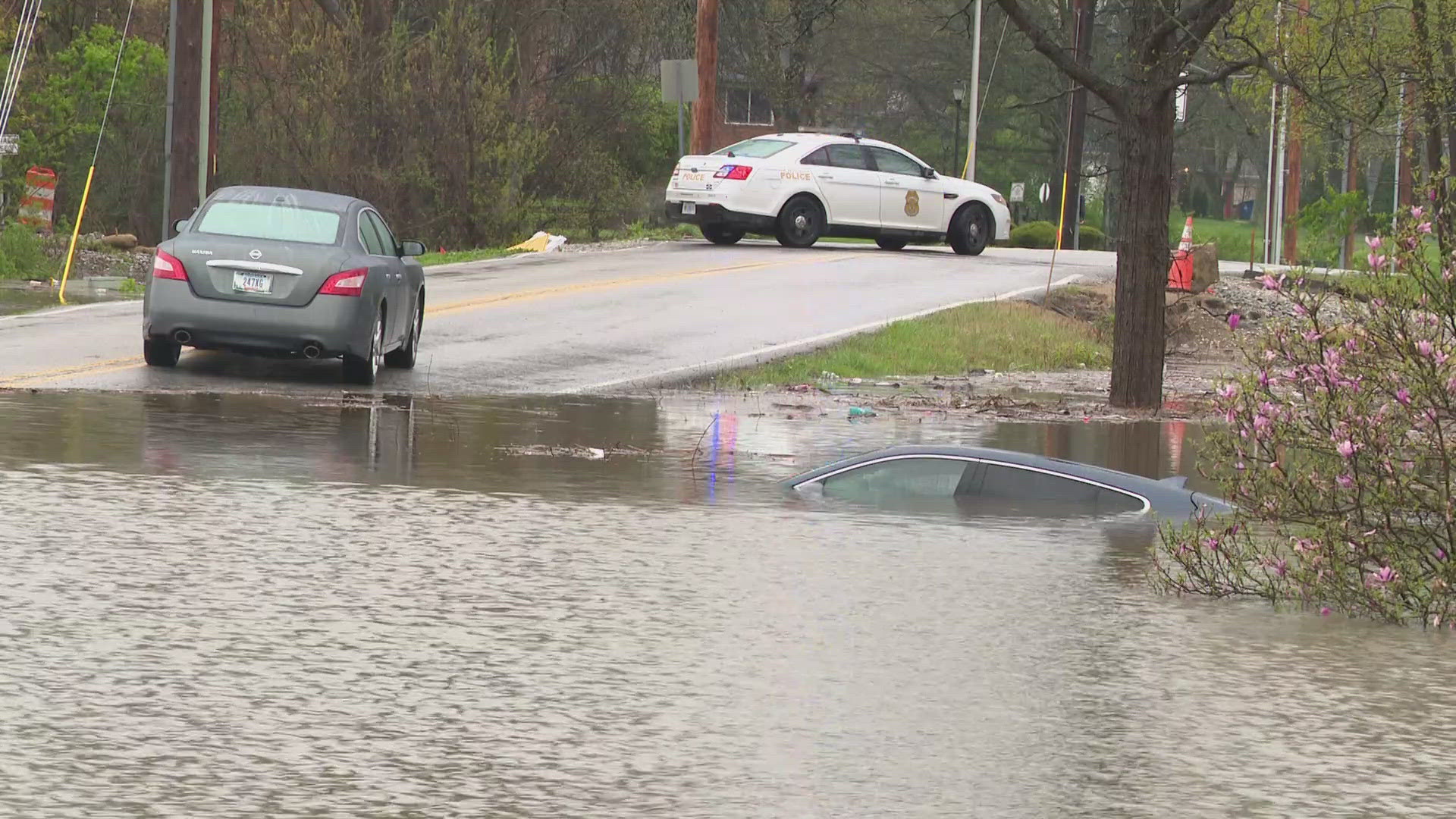Intense flooding in central Indiana leaves many stranded in water, city ...