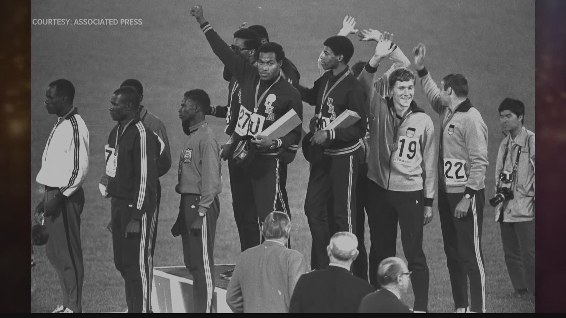 Olympians Tommie Smith and John Carlos throw up fist in 1968 | wthr.com