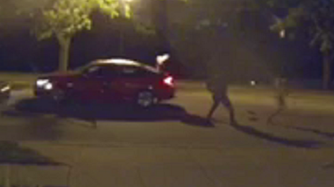 Home security camera captures person escaping trunk being shot at ...