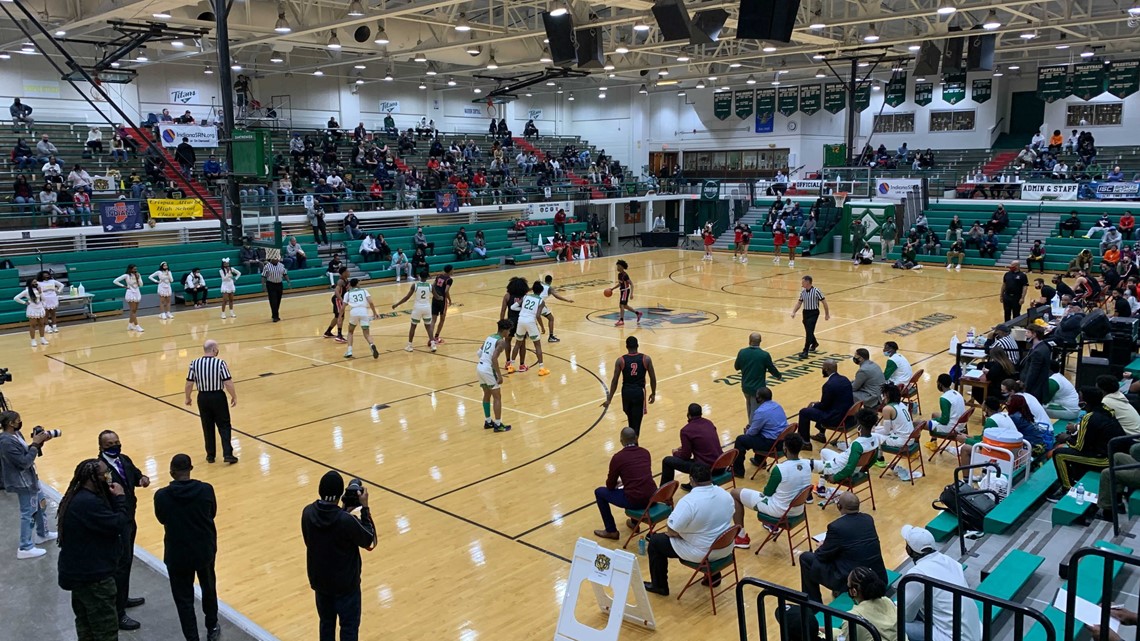 Packed gyms give way to social distancing as sectional basketball games ...