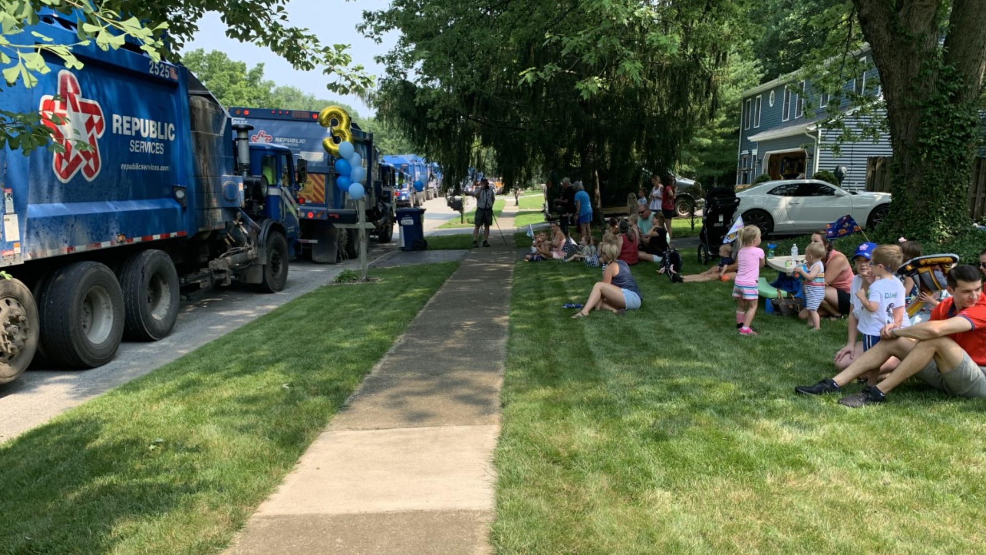 Carmel boy's birthday parade led by a fleet of garbage trucks | wthr.com