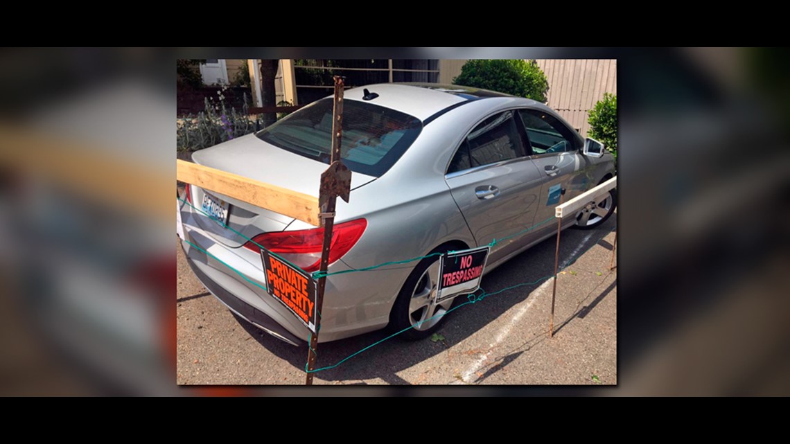 Seattle man builds fence around car-share vehicle at duplex | wthr.com