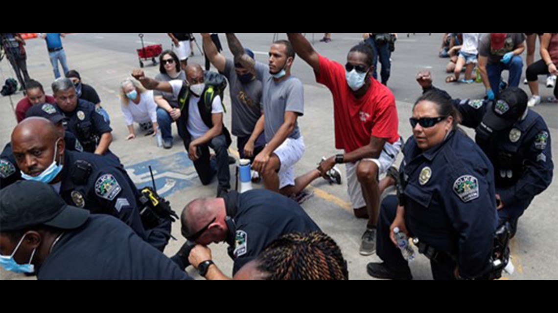 Georgia state trooper tells protesters he 'only kneels for one person ...