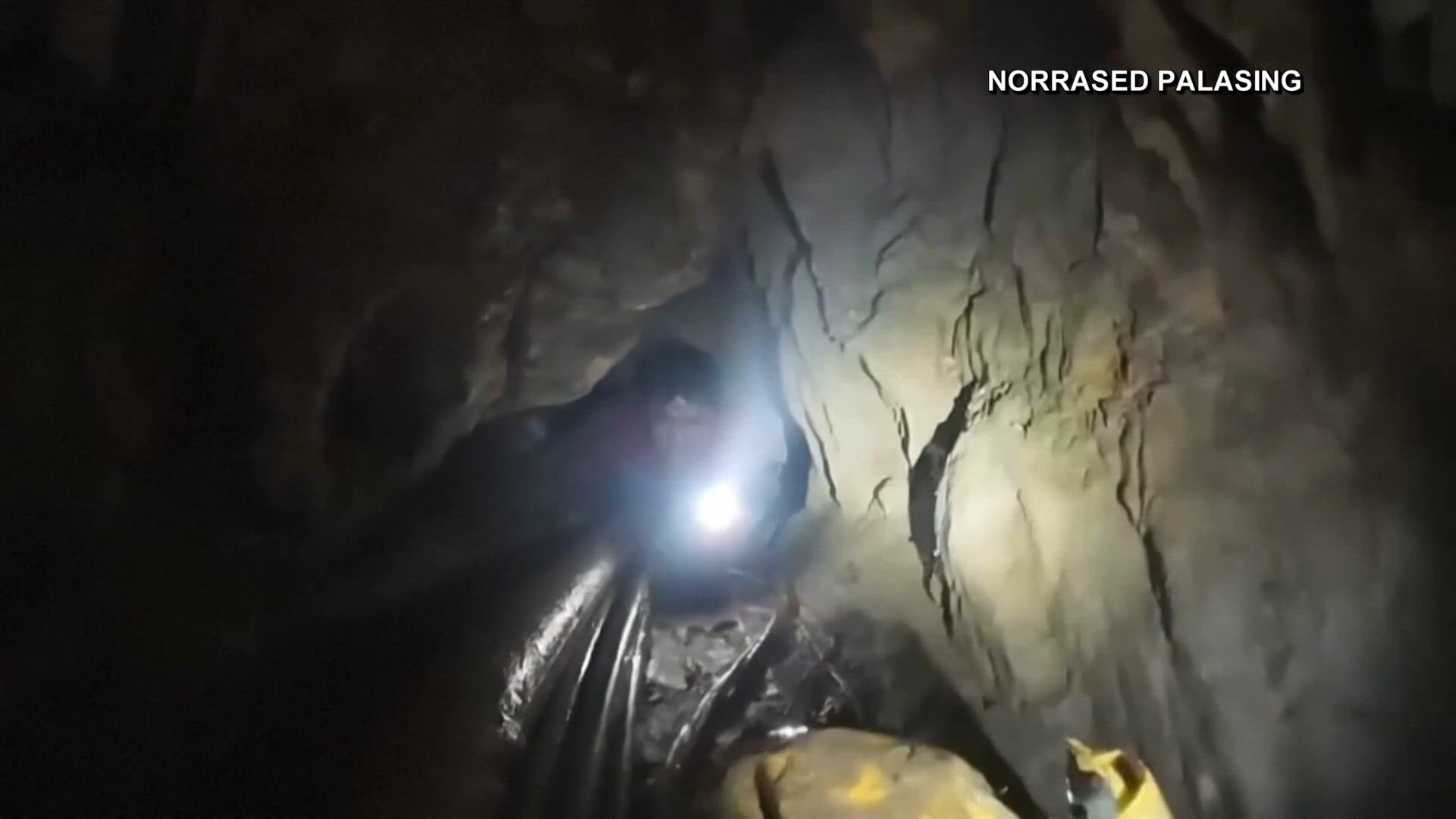 Rescuers search for alternative route to reach 2 missing in a flooded ...