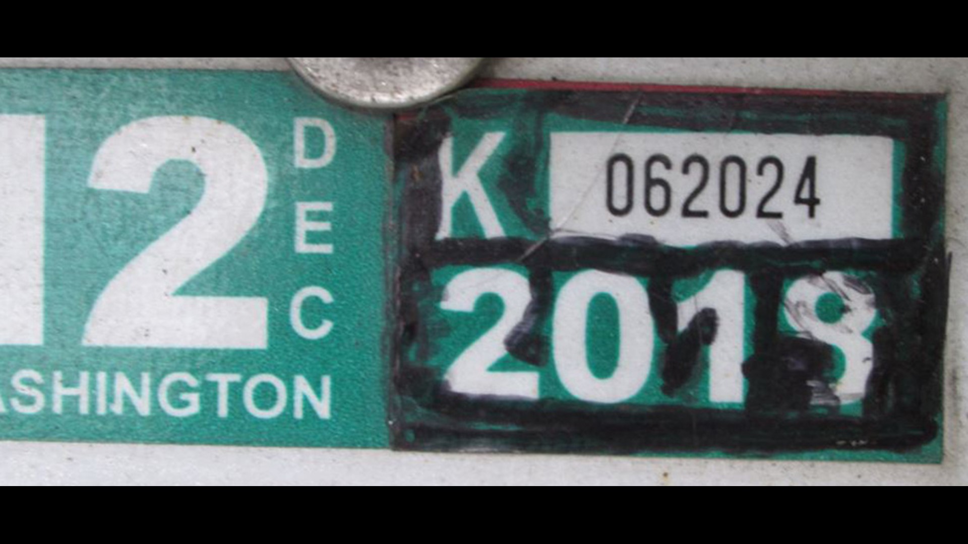 'Sneaky' driver caught with expired license plate tab colored in to say ...