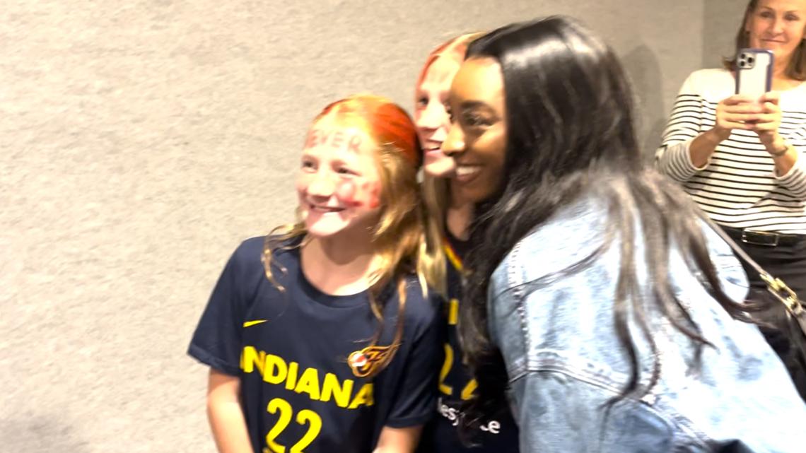 Simone Biles, Gabby Thomas attend Fever game, meet Caitlin Clark | weareiowa.com