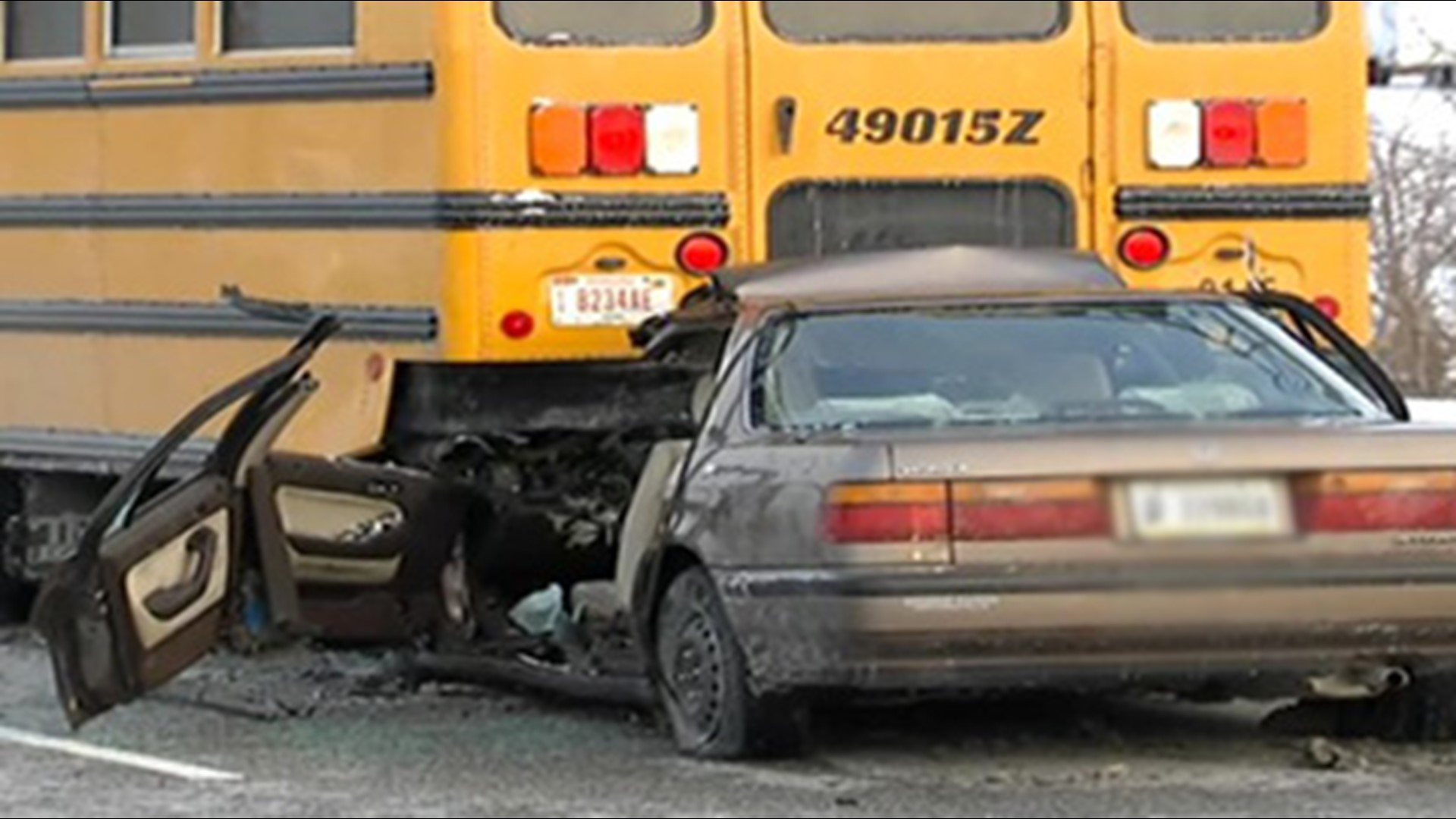 Woman critically injured after car rear-ends school bus | wthr.com