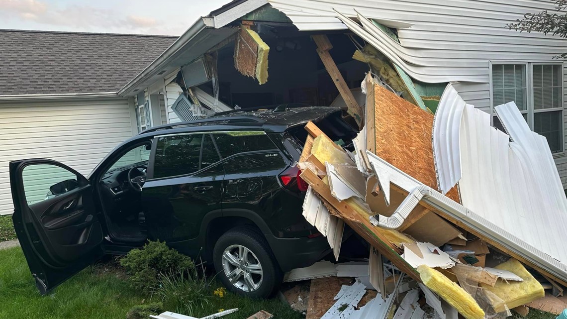 Police search for driver after SUV crashes into house | wthr.com