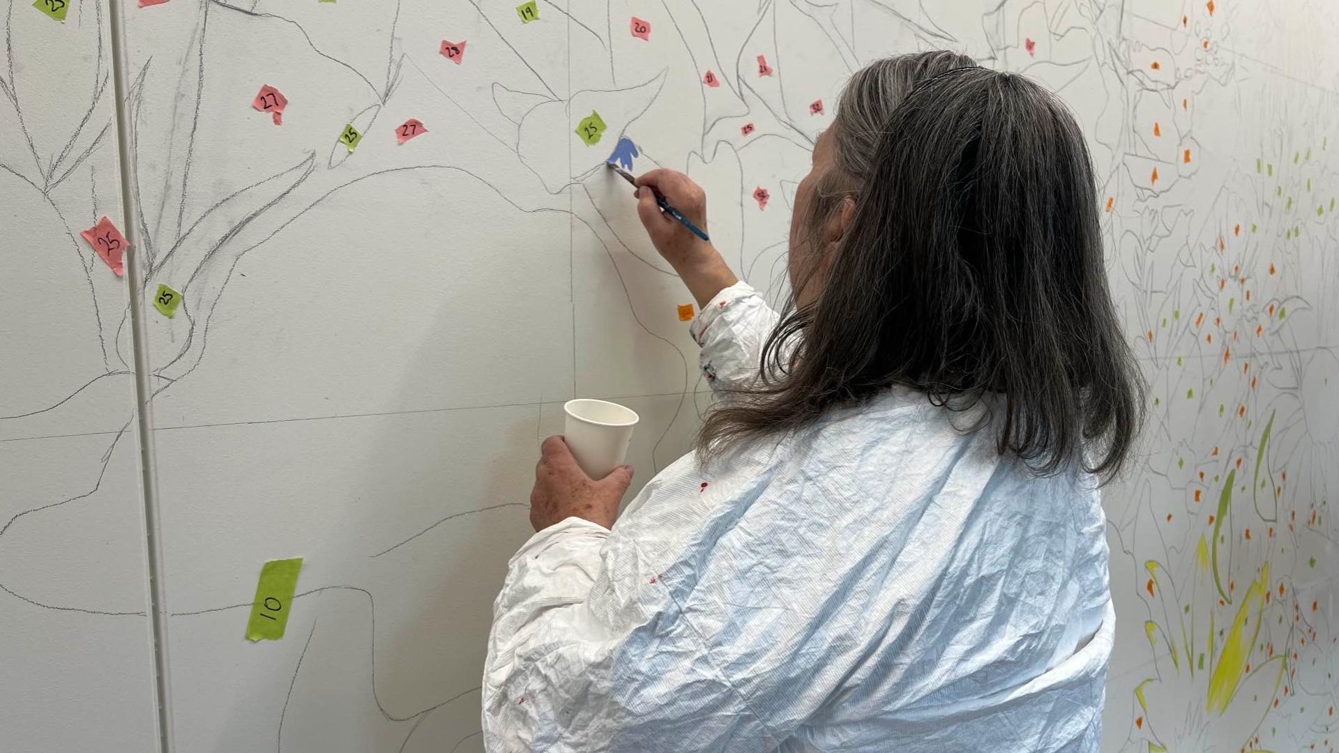 Mural inside new Damien Center facility created by volunteers | wthr.com