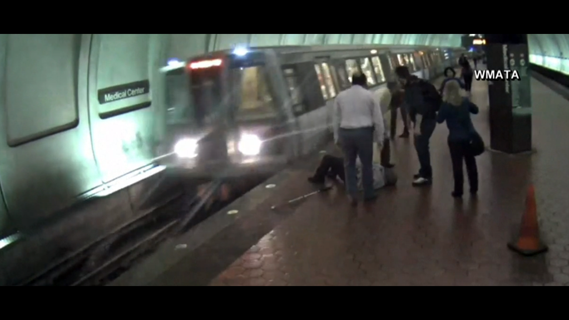 Rail passengers rescue man after he fell onto commuter train tracks ...