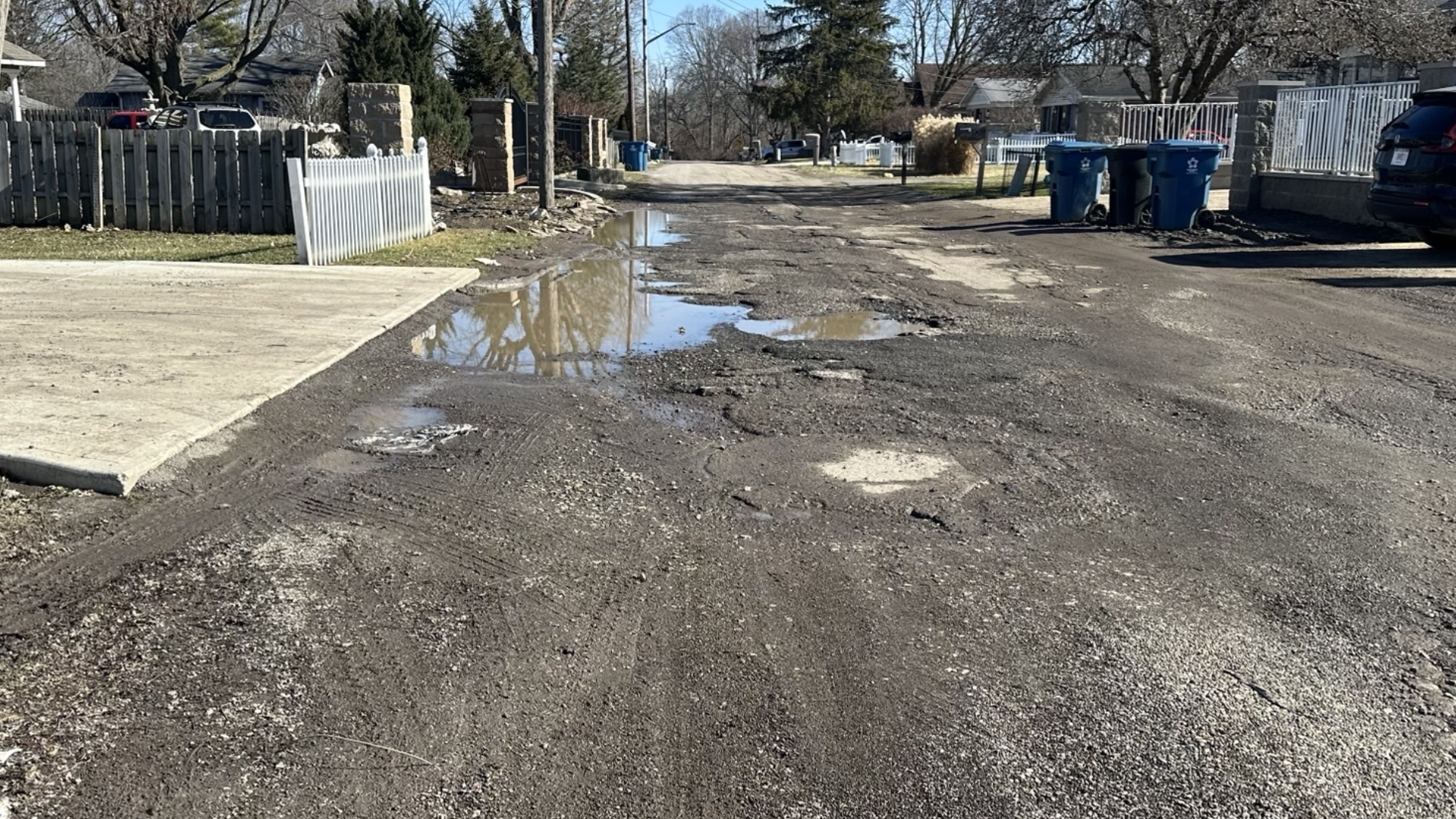 Pothole-filled Indy road costing drivers thousands | wthr.com