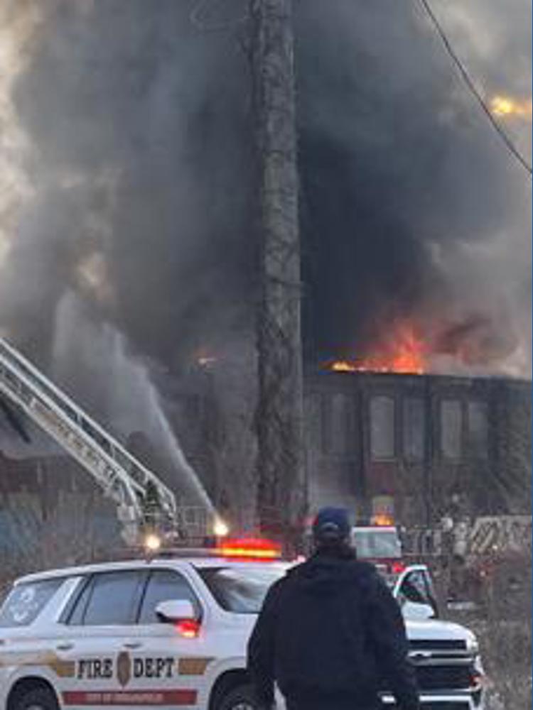 Indianapolis firefighters battle large fire at vacant building on city ...