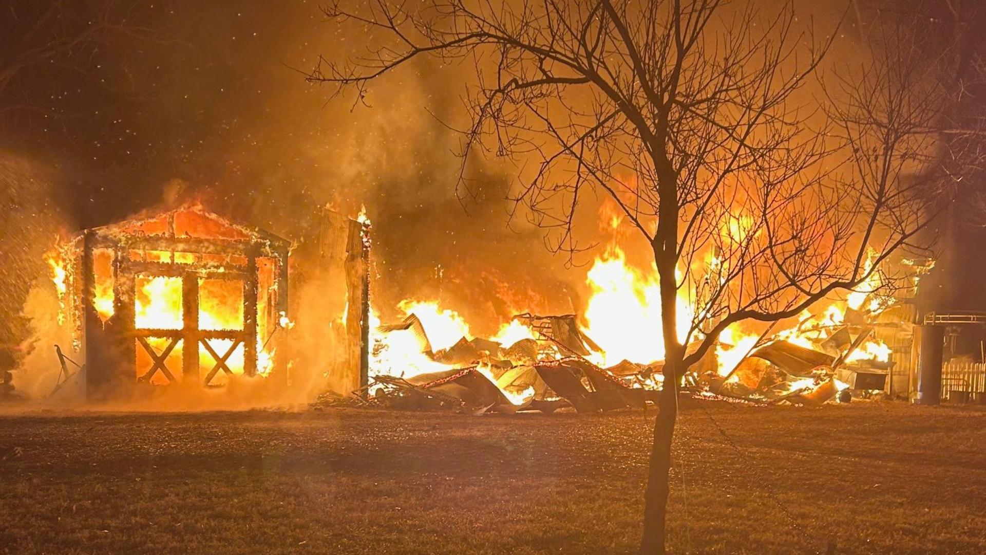 Zionsville fire burns down garage with family inside home nearby | wthr.com