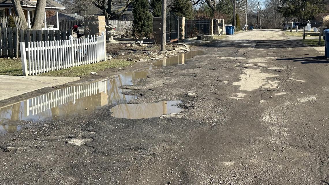Pothole-filled Indy road costing drivers thousands | wthr.com
