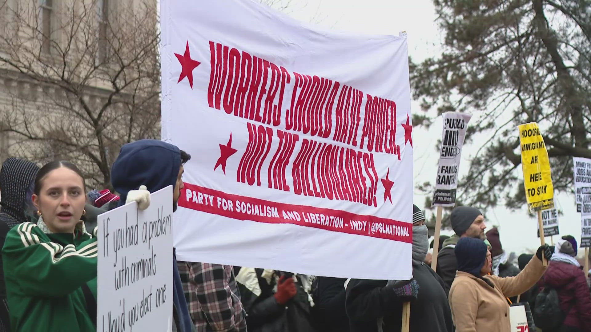 Rally held against executive order mandating police cooperate with ICE ...