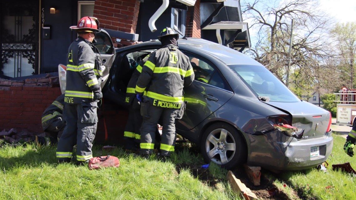 2 hurt when car hits house after collision. | wthr.com