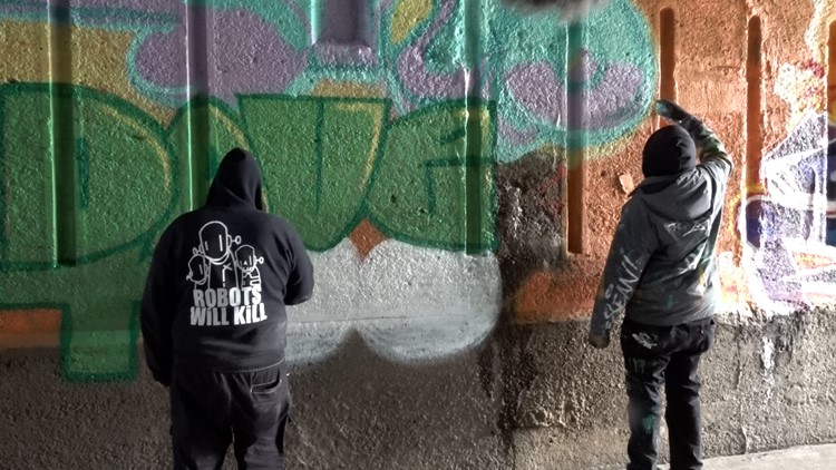 Artists add graffiti murals downtown ahead of All-Star Weekend | wthr.com