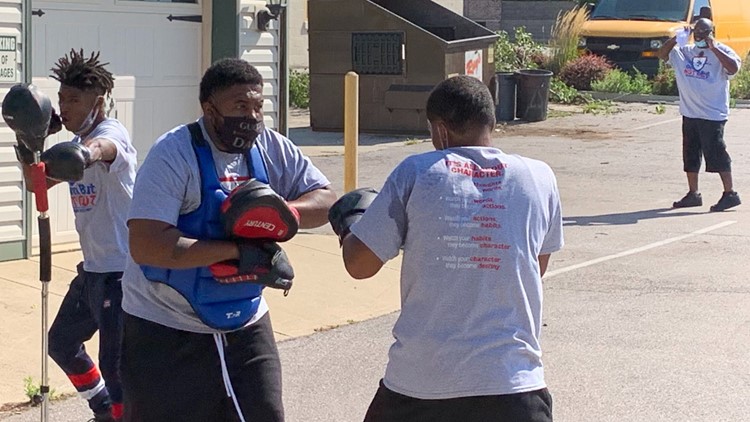 Boxing coach shares his story of triumph, inspires next generation ...