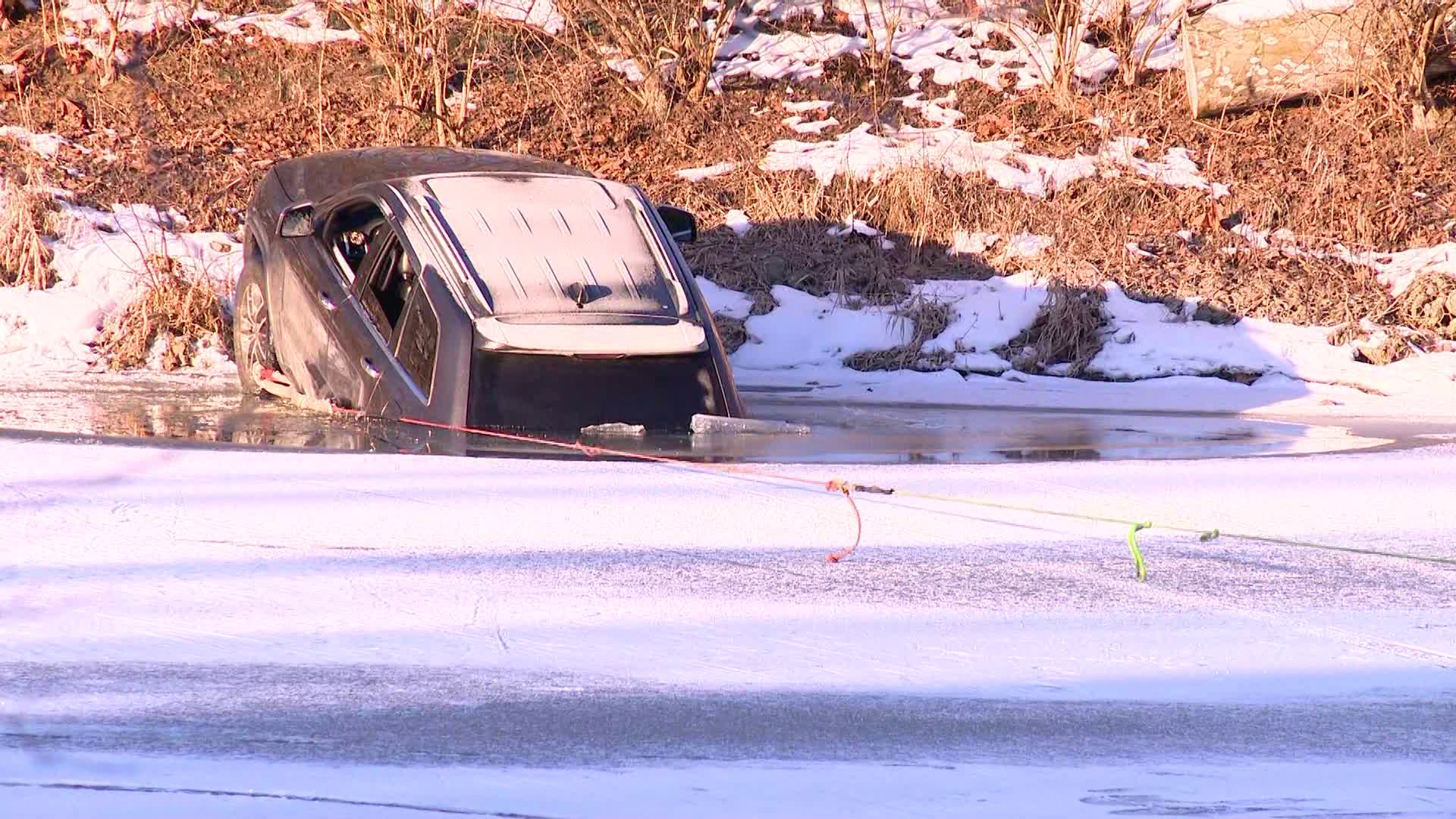 IFD warns of ice dangers after car drives out on White River, falls ...