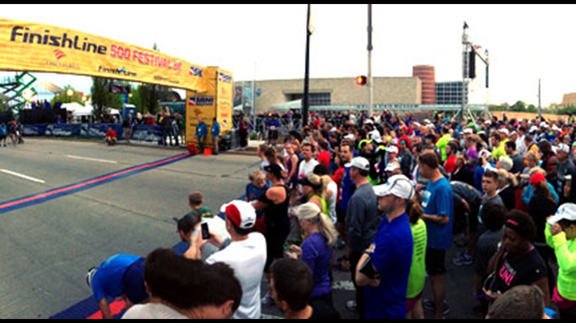 Runners crossing the finish line of the Mini Marathon | wthr.com