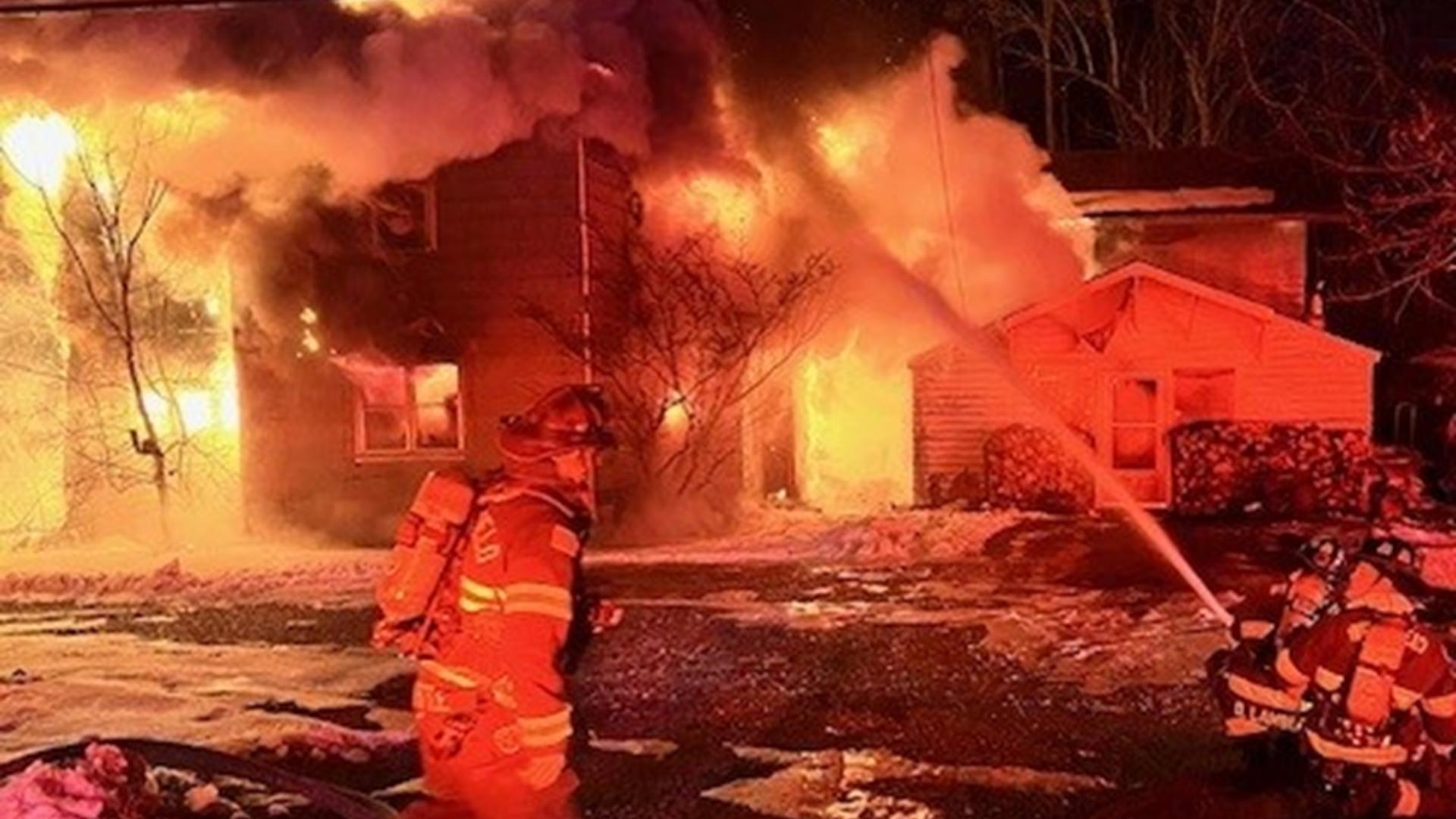 Bitterly cold conditions challenge firefighters battling Westfield ...