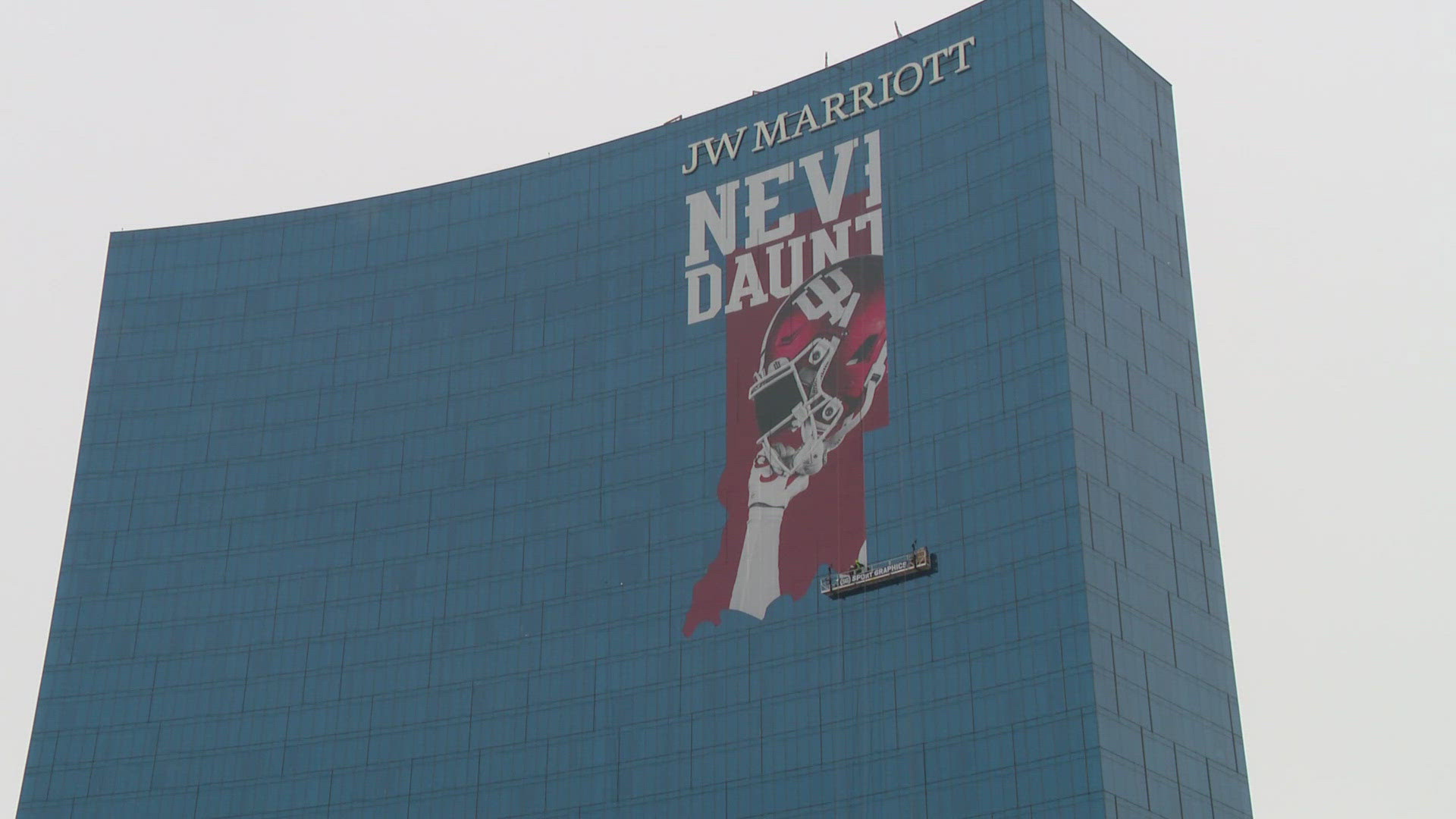 IU football banner goes up on JW Marriott | wthr.com