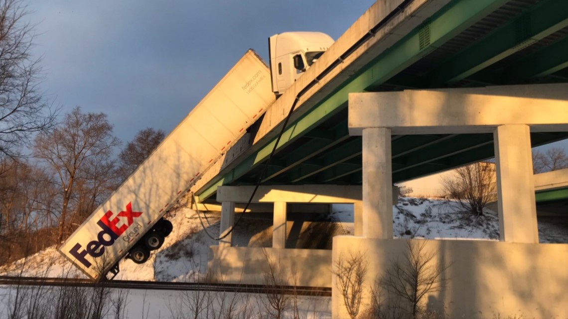 FexEx semi-trailer dangles off Indiana bridge | 10tv.com
