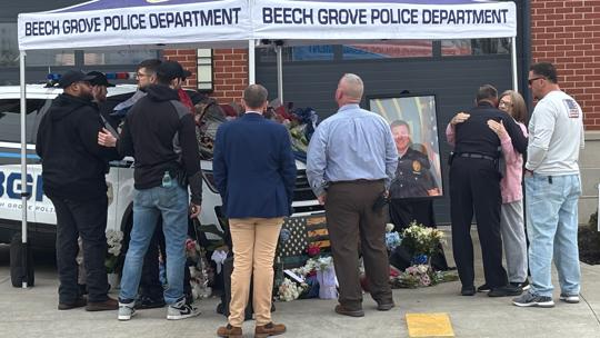 Dozens lay tributes at memorial for Beech Grove Ofc. Brian Elliott ...