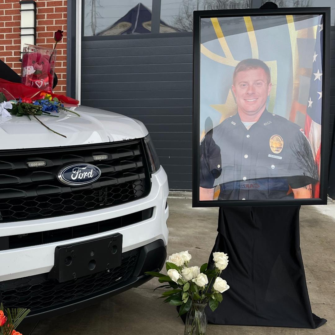 Dozens lay tributes at memorial for Beech Grove Ofc. Brian Elliott ...