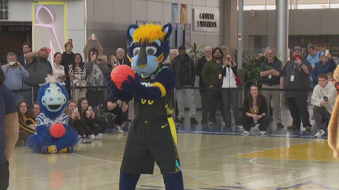 Mascots compete in free throw challenge on airport All-Star court ...