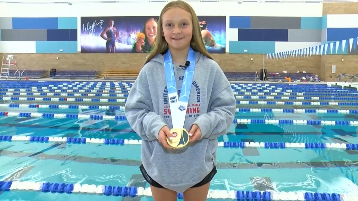 King gives young swimmer her gold medal at U.S. Swim Trials | wthr.com