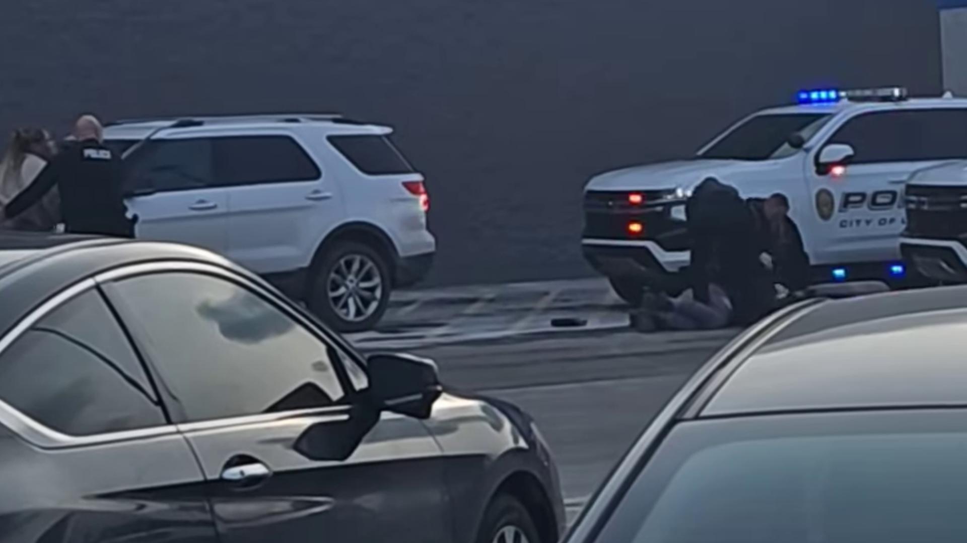 Lawrence police investigating video showing officer hitting man | wthr.com
