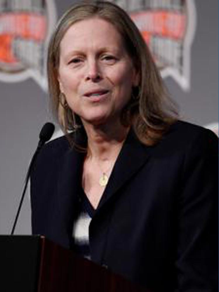 Founding WNBA President Val Ackerman receiving Indiana Fever's Lin Dunn ...