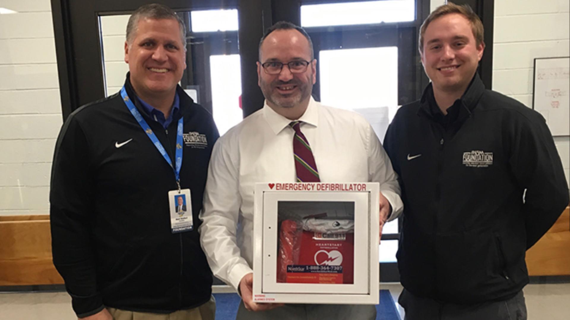 Man saved by co-workers after collapsing at work in downtown ...