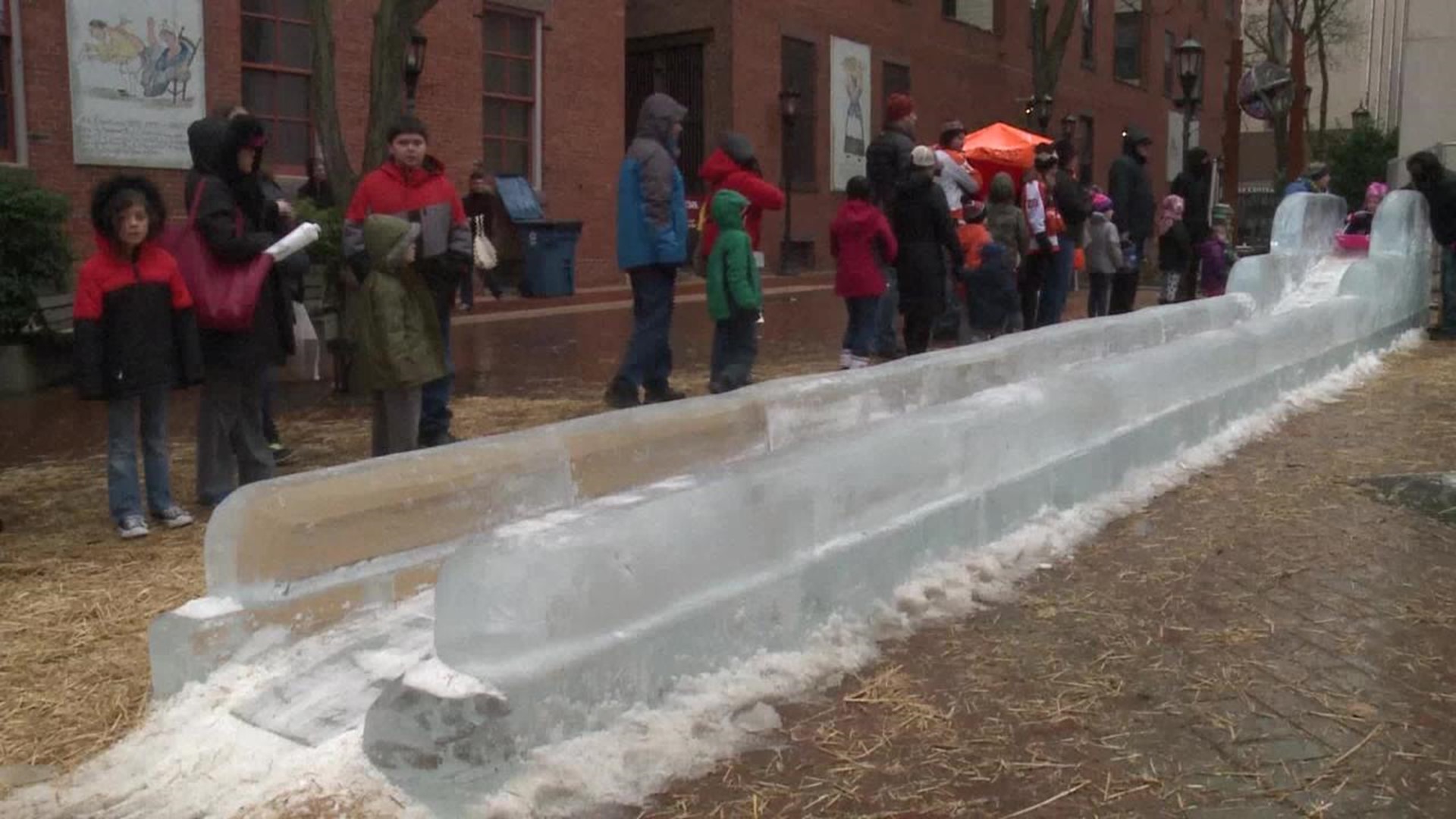 Ice sculptors create slide for kids | wthr.com
