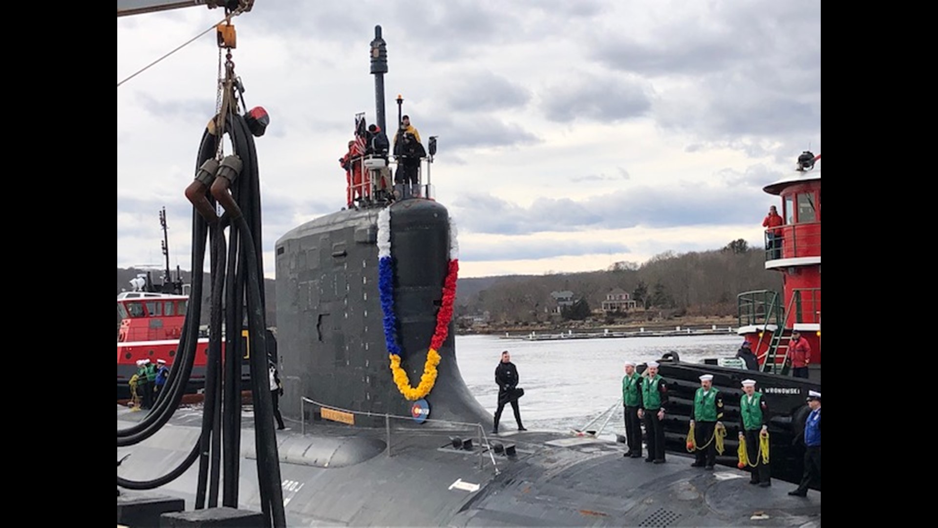 A sub above, the USS Colorado surfaces in Groton after six months at ...