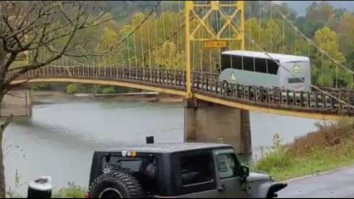 Video shows bridge dip sharply as overweight bus drives over | fox61.com