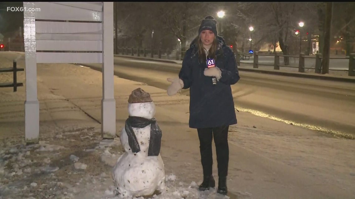 FOX61 reporter makes snowman as nor'easter snowfall begins | fox61.com
