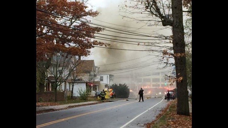 Roof collapses as Norwalk firefighters battle fire at shopping center ...