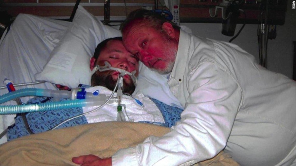 Father speaks out year after using gun to stop hospital from taking son ...