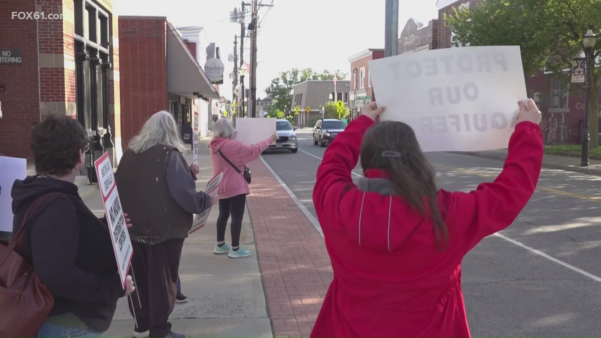 Amazon warehouse protest outside Killingly town hall amid environmental ...