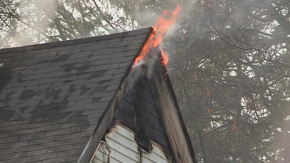 Hartford firefighters rescue two people from burning building | fox61.com